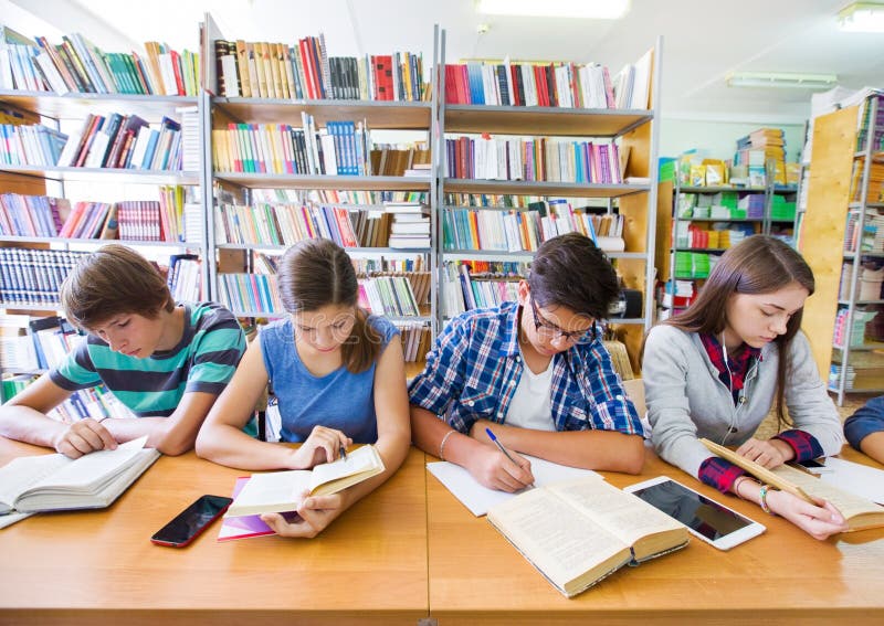 Teens in library stock image. Image of people, adults - 98726937