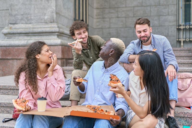 Group of Students Enjoying a Delicious Pizza. Stock Image - Image of ...
