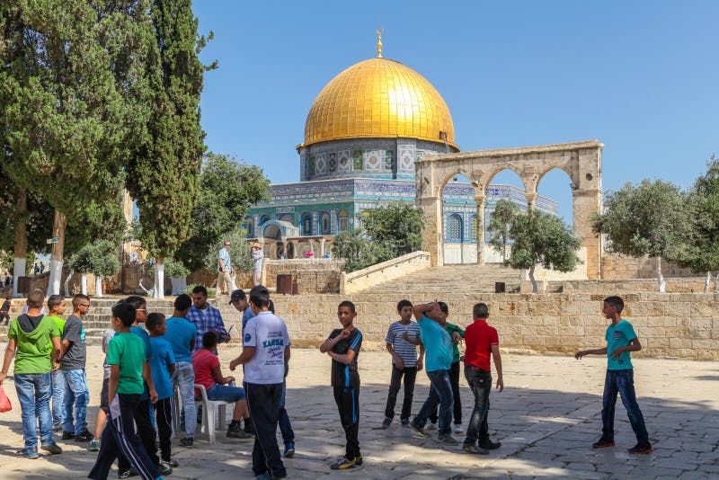 A Group of Students in Front of Dome of the Rock and the Arches of the ...