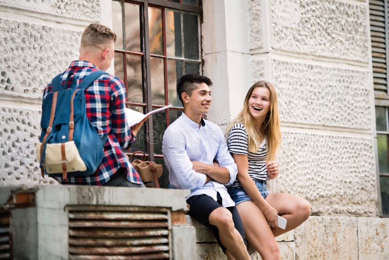 Group of Students in Front of University Studying, Having Fun. Stock ...