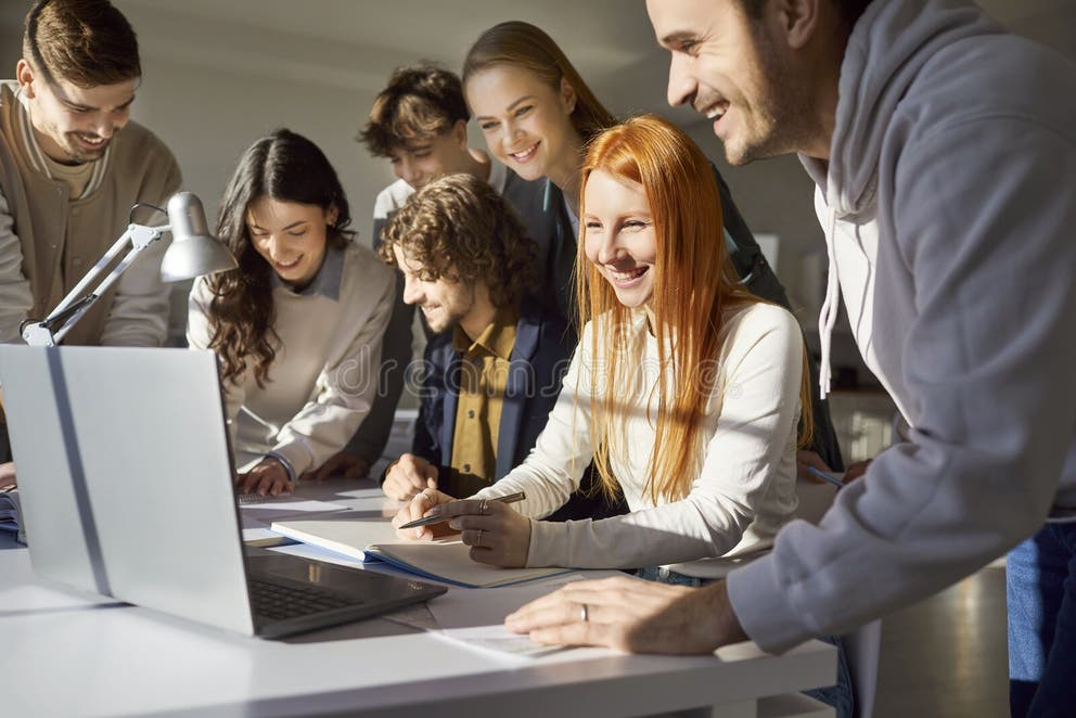 Group of Students Gathering Together, Using Laptop for Studying, Watching Workshop Online Stock ...
