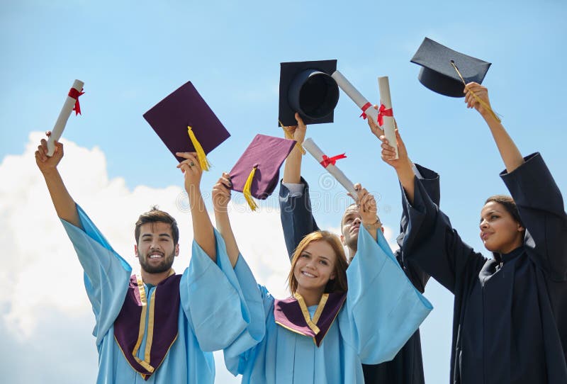 Group of Students in Graduation Gowns and Caps Stock Photo - Image of ...
