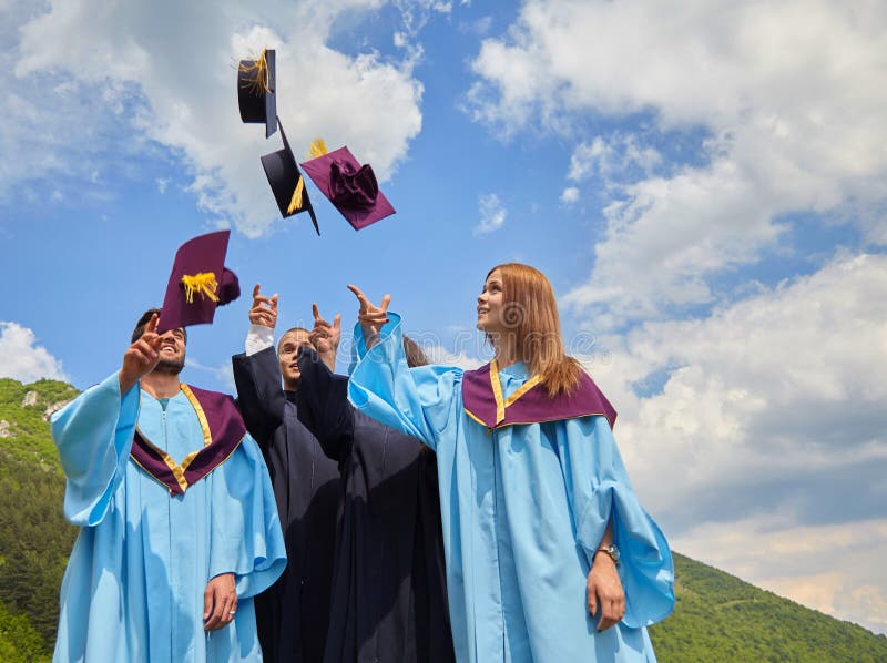 Group of Students in Graduation Gowns and Caps Stock Image - Image of ...
