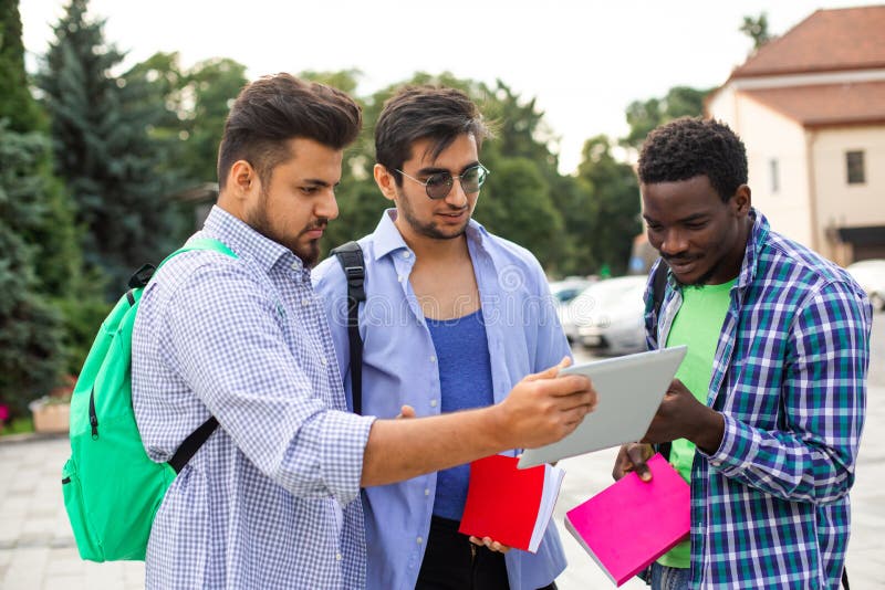 The Group of Students Help Your Classmate with Navigation Stock Image ...