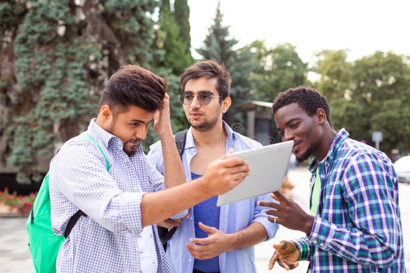 The Group of Students Help Your Classmate with Navigation Stock Image ...