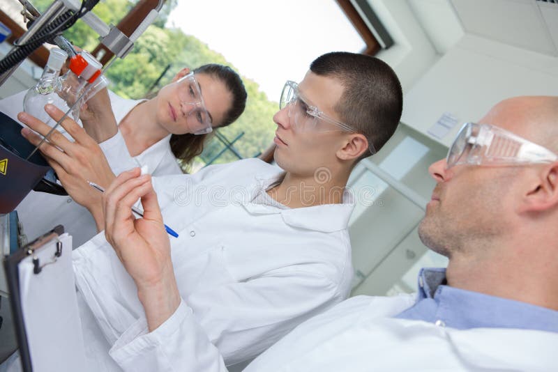 Group students in lab stock image. Image of analyzing - 173911045