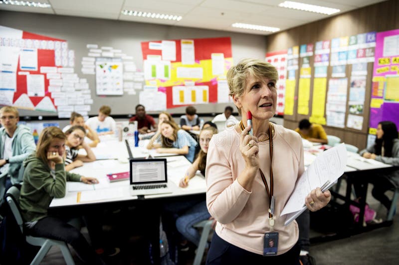 Group of Students Learning in Classroom Stock Photo - Image of boys ...