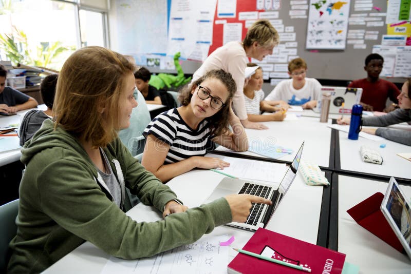 Group of Students Learning in Classroom Stock Image - Image of ...