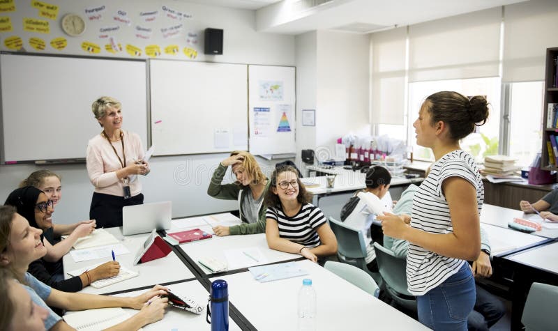 Group of Students Learning in Classroom Stock Image - Image of ...