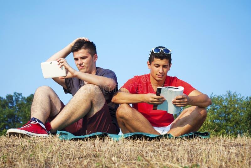 Group of Students Learning Outdoor Stock Photo - Image of campus ...