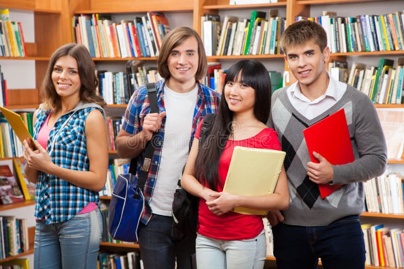 Teenage Students in Library Reading Books Stock Photo - Image of inside ...