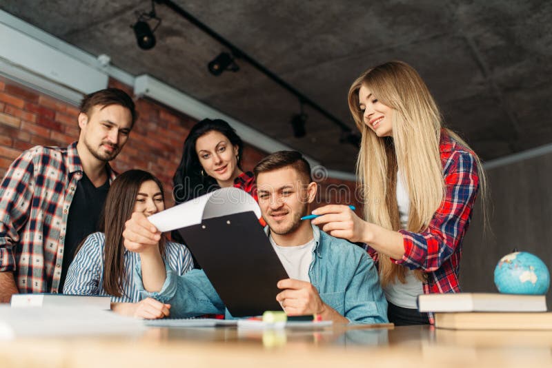 Group of Students Looking on Laptop Together Stock Photo - Image of ...