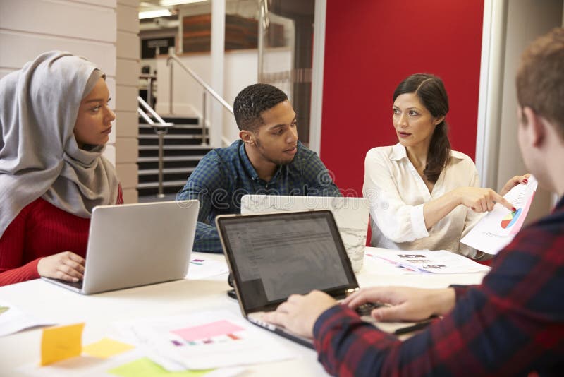 Group of Students Meeting for Tutorial with Teacher Stock Photo - Image ...