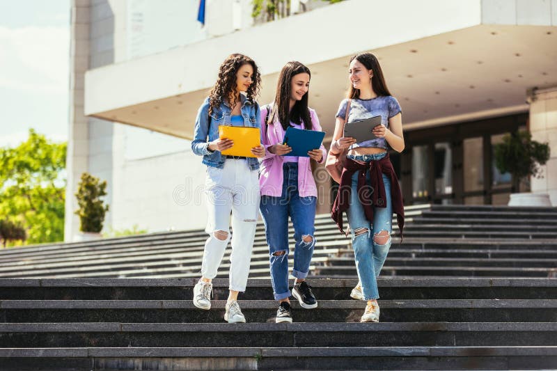 Students with Notebook Studying Together Outdoors Stock Image - Image ...