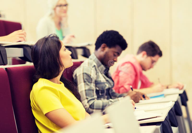 Group of Students with Notebooks in Lecture Hall Stock Photo - Image of ...