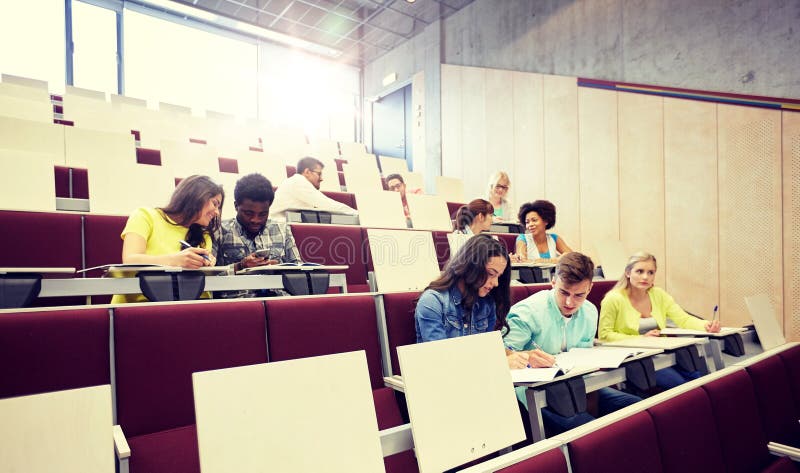 Group of Students with Notebooks at Lecture Hall Stock Photo - Image of ...