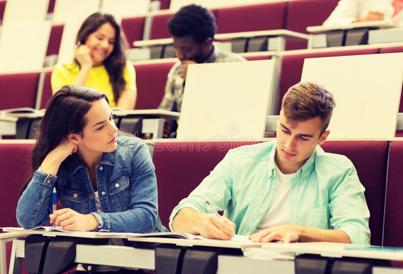 Group of Students with Notebooks in Lecture Hall Stock Image - Image of ...
