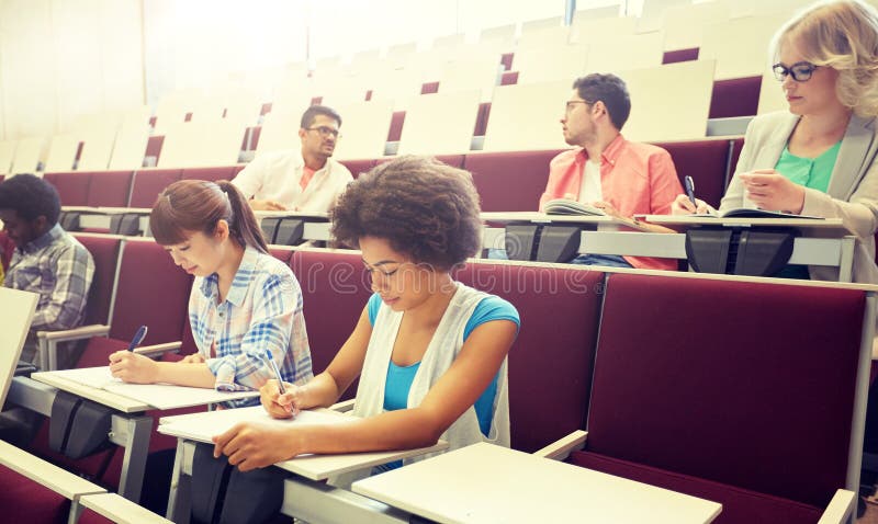 Group of Students with Notebooks at Lecture Hall Stock Image - Image of ...