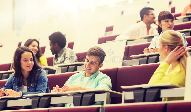 Group of Students with Notebooks in Lecture Hall Stock Image - Image of ...