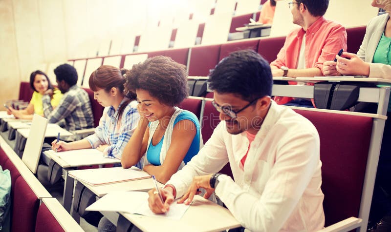 Group of Students with Notebooks in Lecture Hall Stock Image - Image of ...