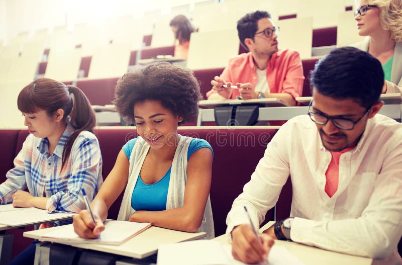 Group of Students with Notebooks in Lecture Hall Stock Image - Image of ...