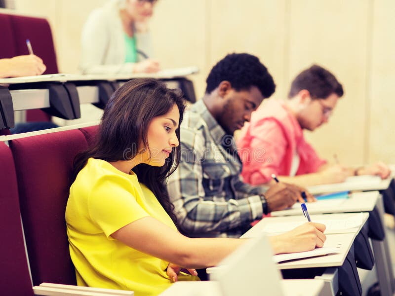Group of Students with Notebooks in Lecture Hall Stock Image - Image of ...