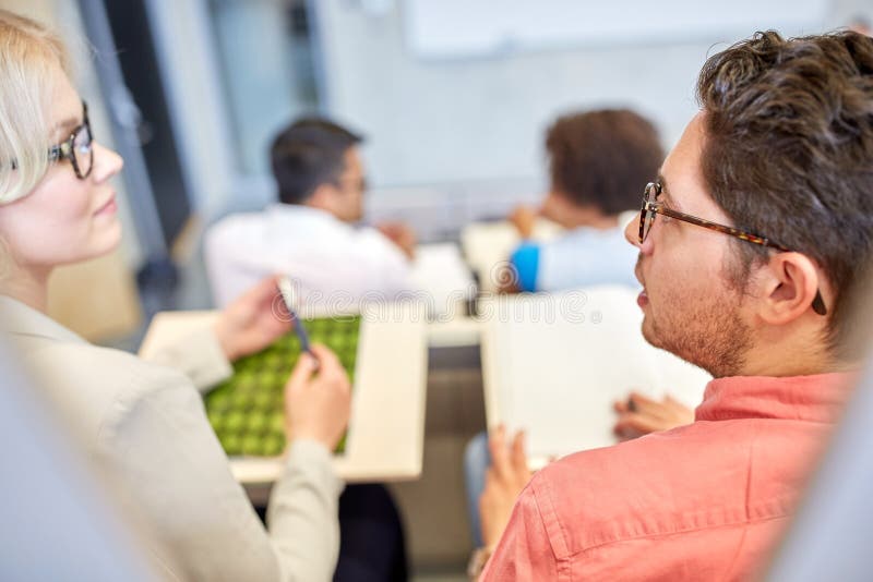Group of Students with Notebooks in Lecture Hall Stock Photo - Image of ...