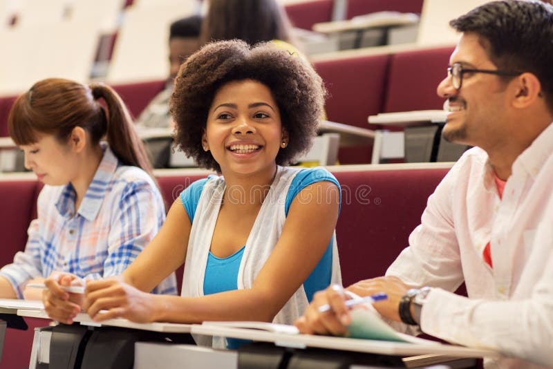 Group of Students with Notebooks in Lecture Hall Stock Image - Image of ...