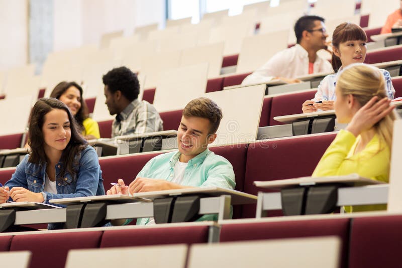 Group of Students with Notebooks in Lecture Hall Stock Image - Image of ...