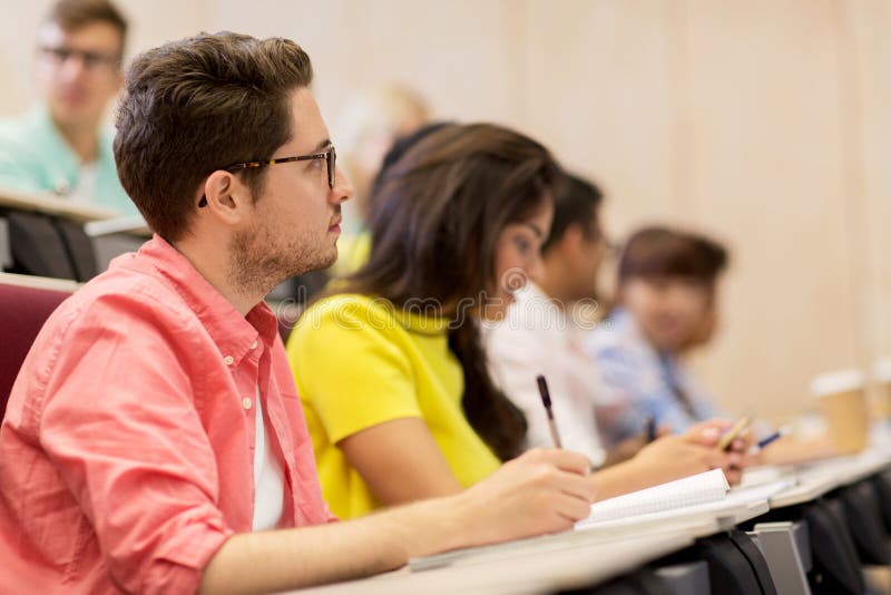 Texting in classroom stock image. Image of students, brunette - 17522809