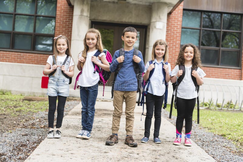 A Group of Students Outside at School Standing Together Stock Photo ...