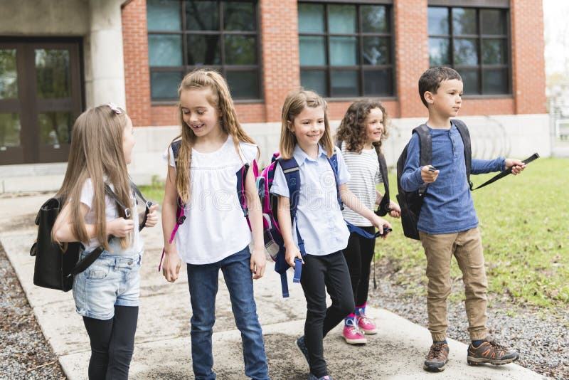 A Group of Students Outside at School Standing Together Stock Photo ...