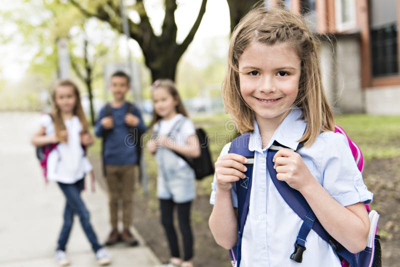 A Group of Students Outside at School Standing Together Stock Photo ...