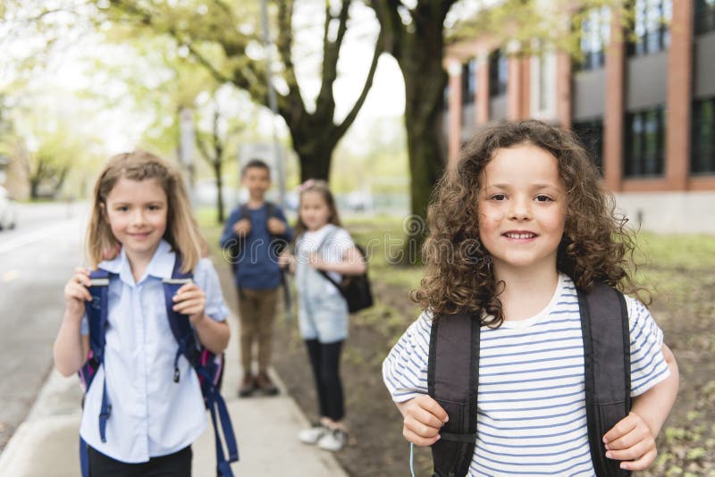 A Group of Students Outside at School Standing Together Stock Photo ...