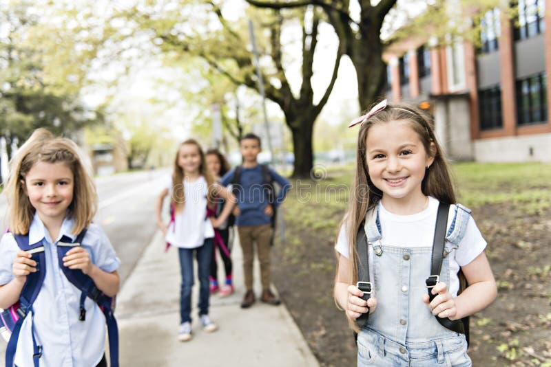 A Group of Students Outside at School Standing Together Stock Image ...