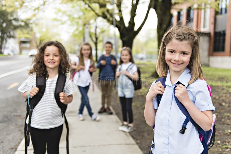 A Group of Students Outside at School Standing Together Stock Photo ...