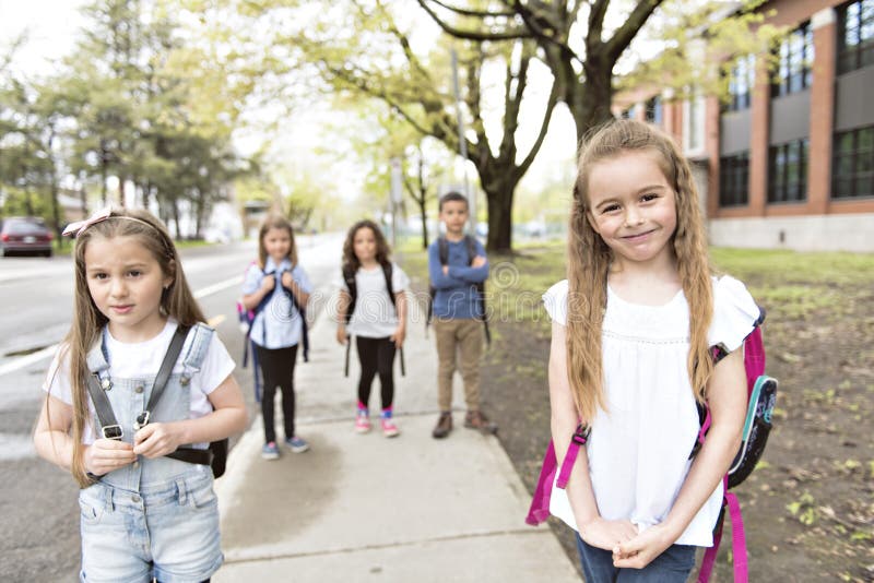 A Group of Students Outside at School Standing Together Stock Photo ...