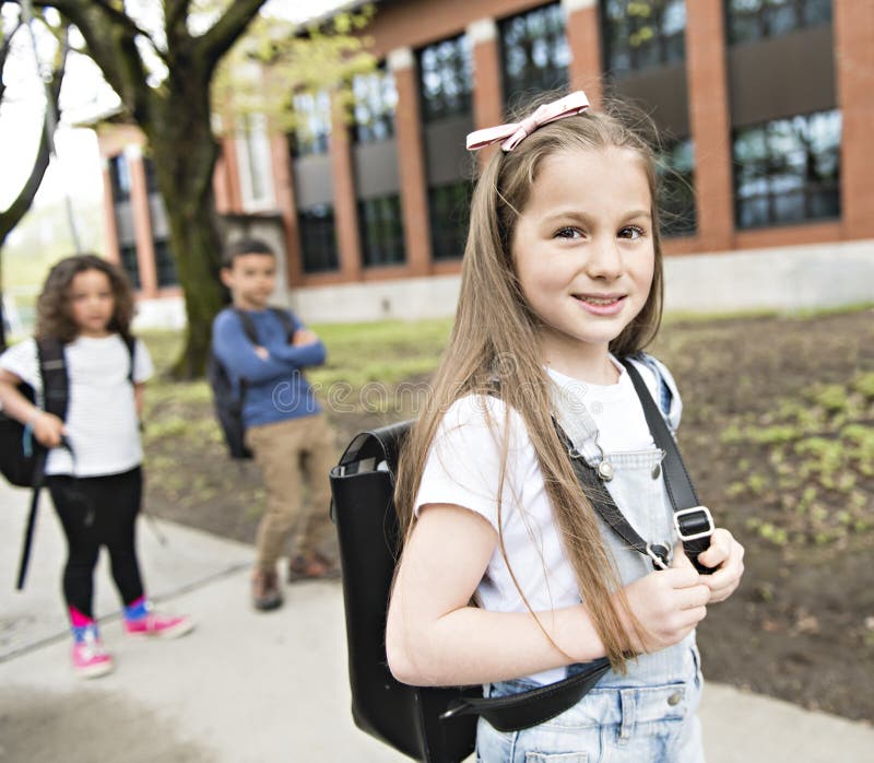 A Group of Students Outside at School Standing Together Stock Photo ...