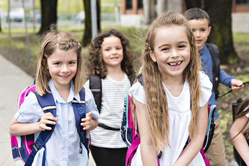 A Group of Students Outside at School Standing Together Stock Photo ...
