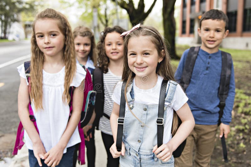 A Group of Students Outside at School Standing Together Stock Image ...
