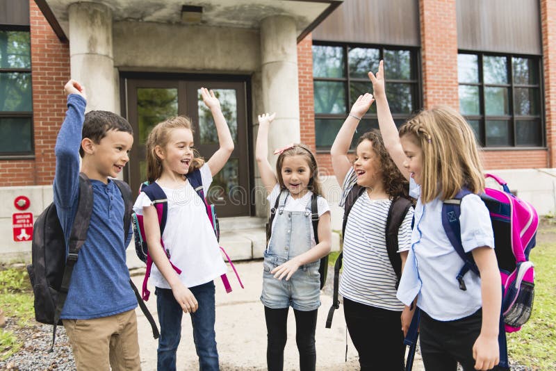 A Group of Students Outside at School Standing Together Stock Image ...