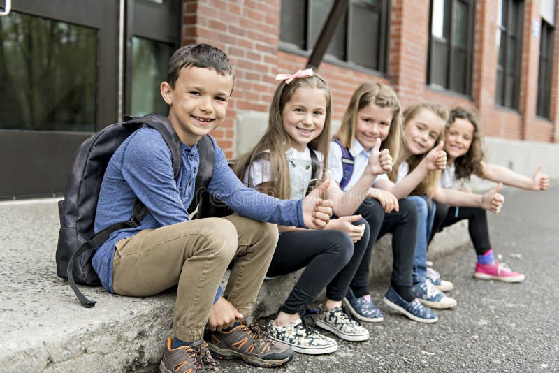 A Group of Students Outside at School Standing Together Stock Photo ...
