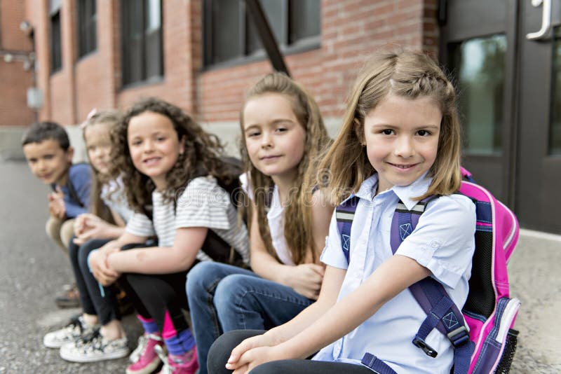 A Group of Students Outside at School Standing Together Stock Photo ...