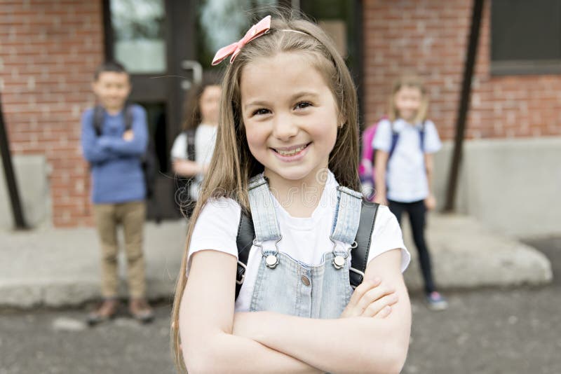 A Group of Students Outside at School Standing Together Stock Photo ...