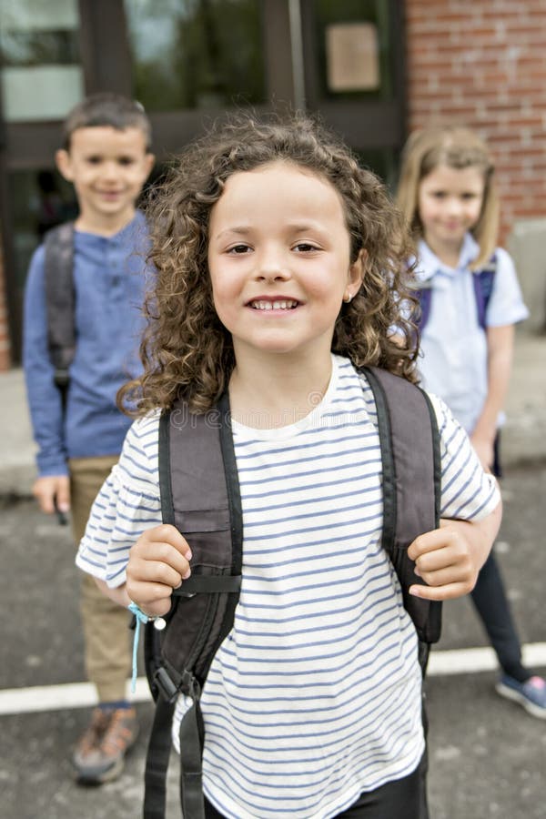 A Group of Students Outside at School Standing Together Stock Photo ...