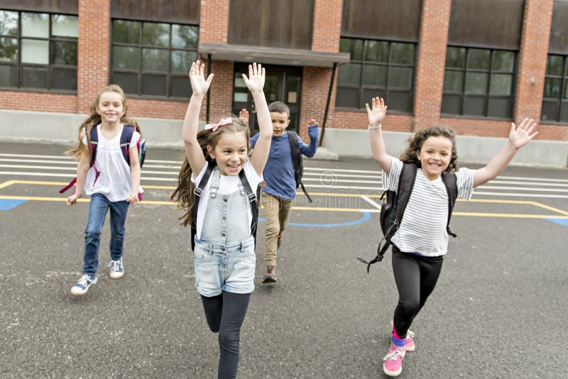 A Group of Students Outside at School Standing Together Stock Photo ...