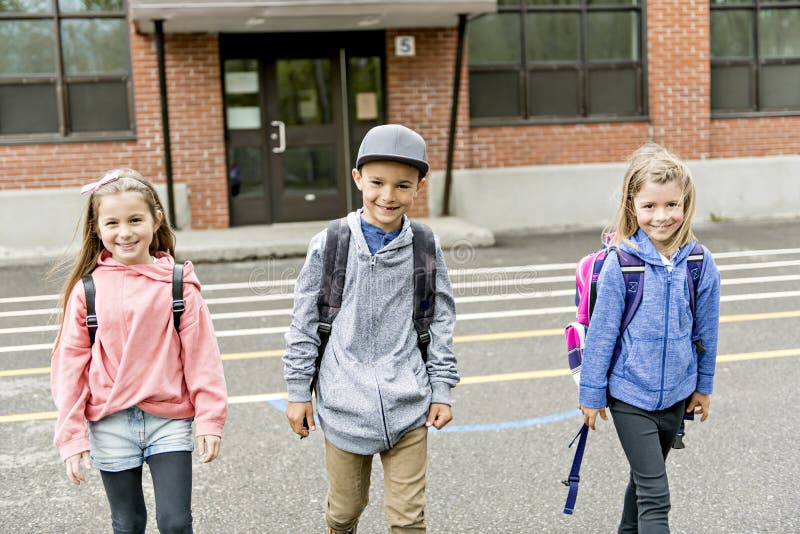 A Group of Students Outside at School Standing Together Stock Image ...