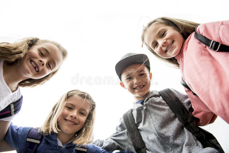 A Group of Students Outside at School Standing Together Stock Photo ...