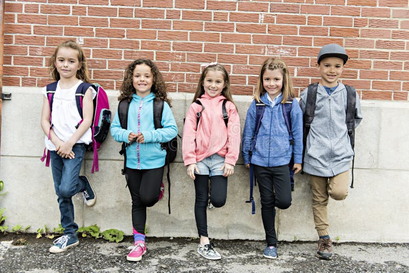 A Group of Students Outside at School Standing Together Stock Photo ...