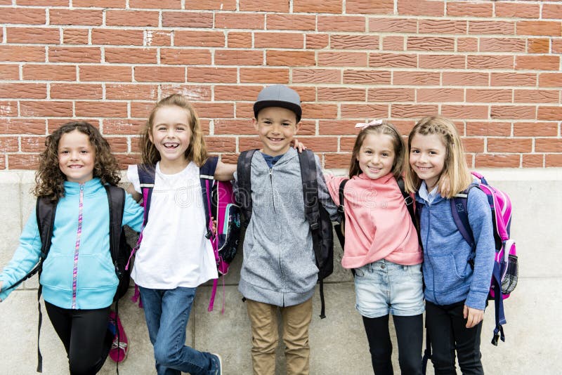 A Group of Students Outside at School Standing Together Stock Photo ...